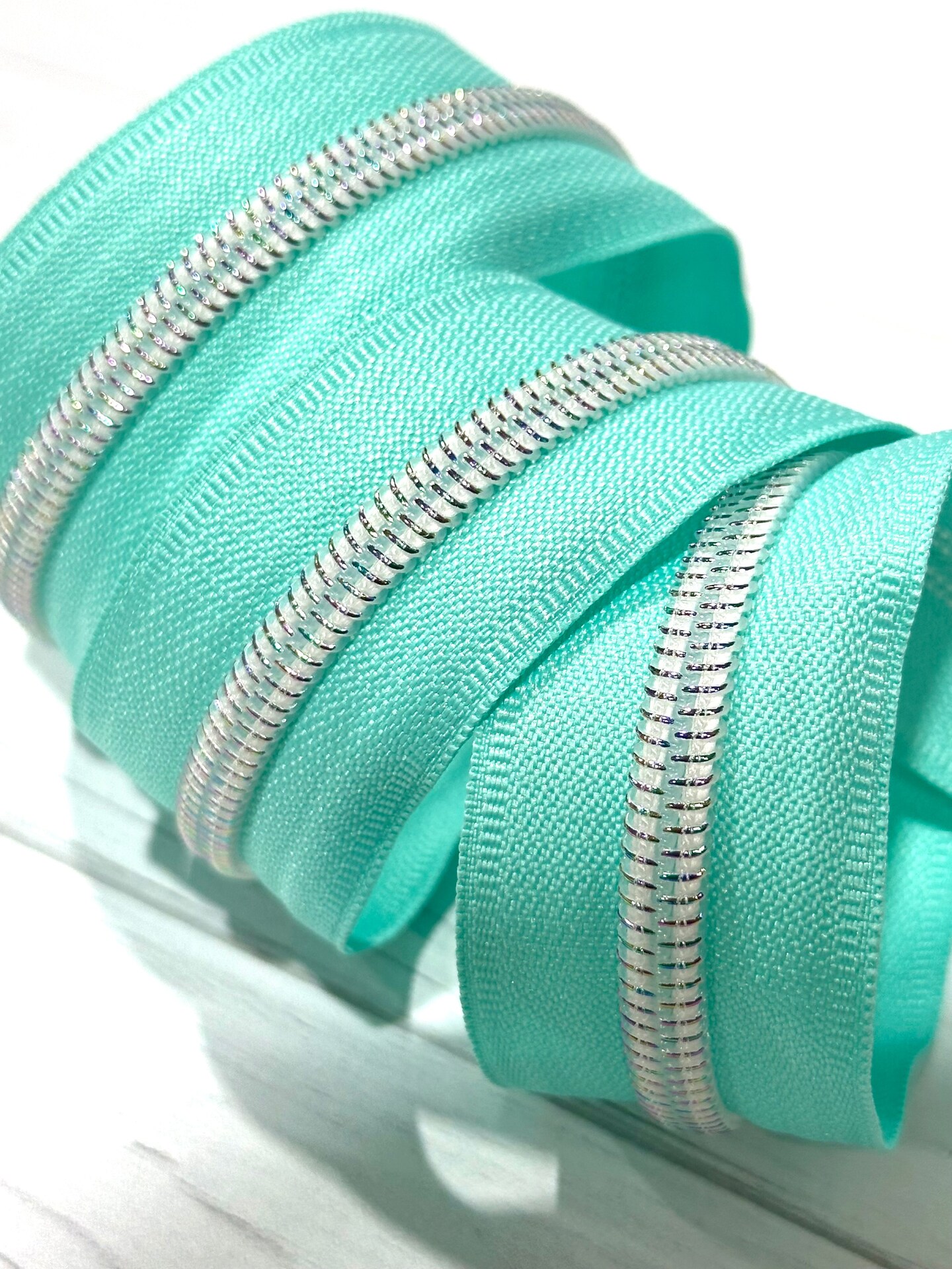 Mint with White Iridescent Teeth Zipper Tape | Michaels