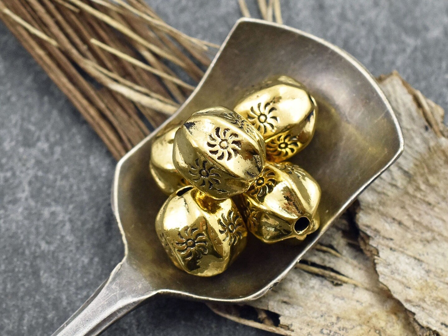 *10* 11x9mm Antique Gold Wedged Rounds w/Sun Design | Michaels