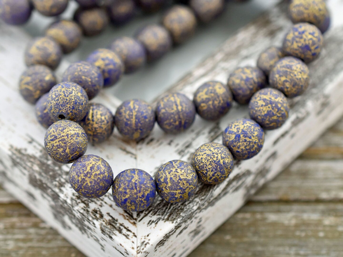 Gold Washed Etched Indigo Round Druk Beads | Michaels
