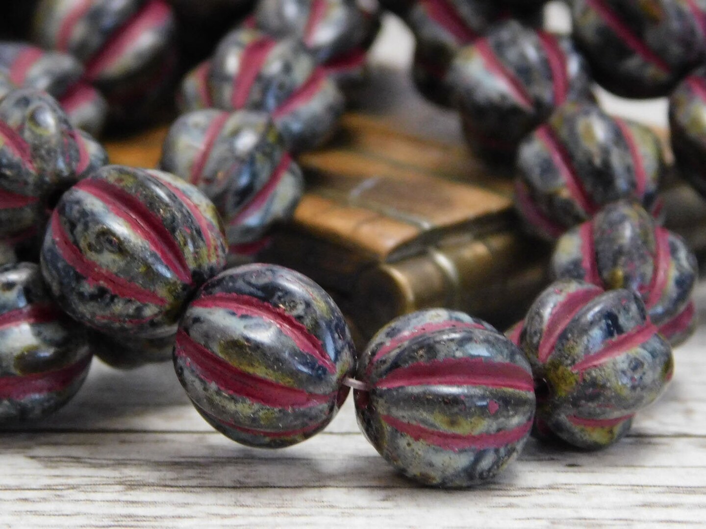 Red Washed Jet Picasso Round Melon Beads | Michaels