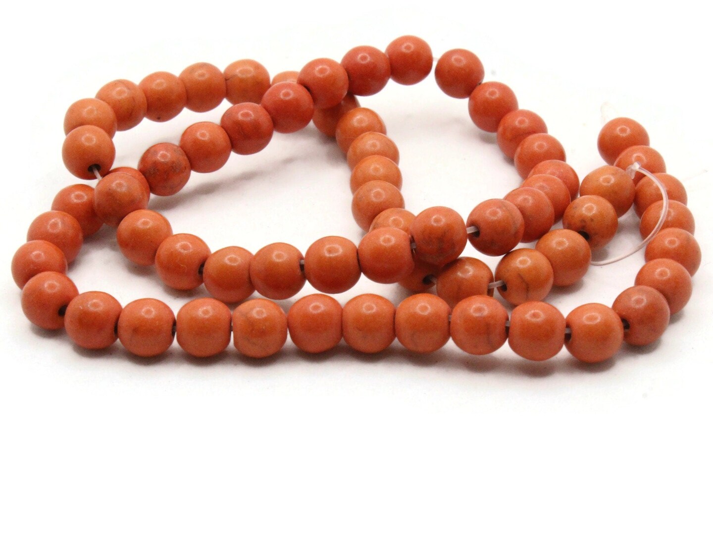 65 5mm to 6mm Round Dyed Orange Howlite Stone Beads | Michaels