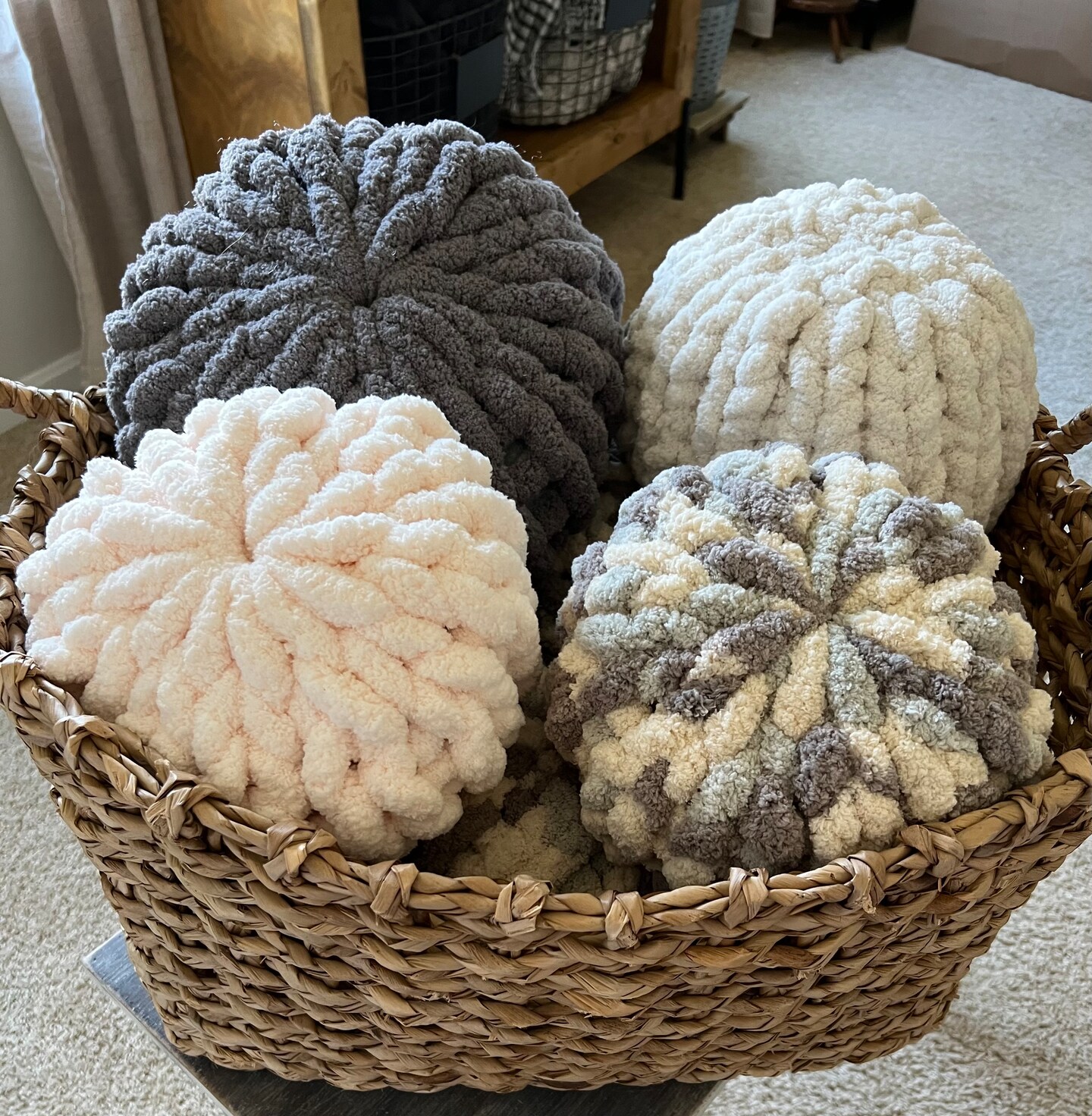 Cozy Crafted Hand-Knit Round Pillows | MakerPlace by Michaels