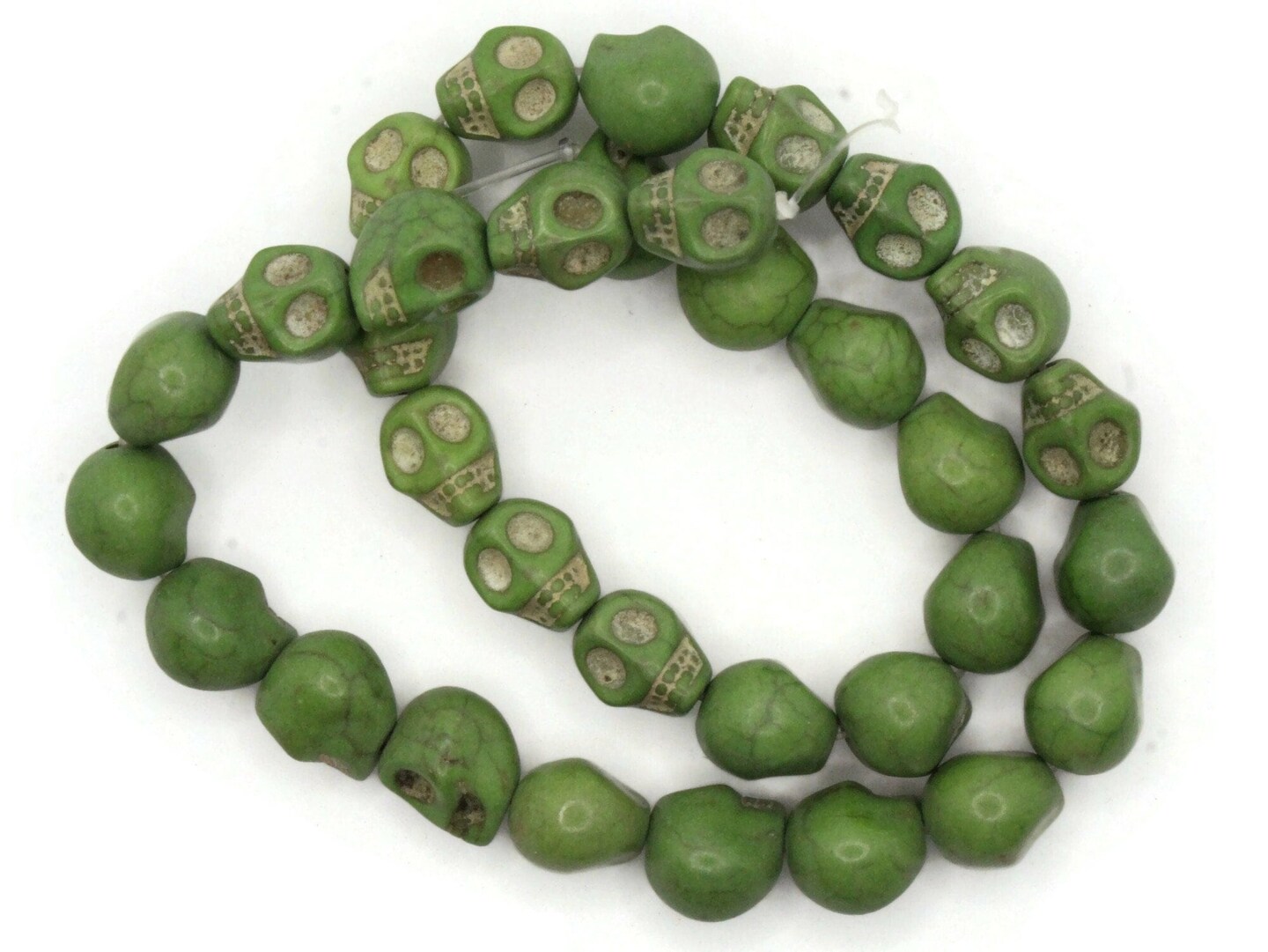 33 13mm Green Dyed Howlite Stone Skull Beads | Michaels