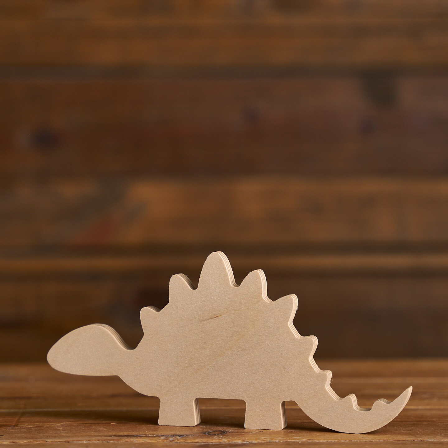 9 in. Unfinished Wooden Stegosaurus Shape | Michaels
