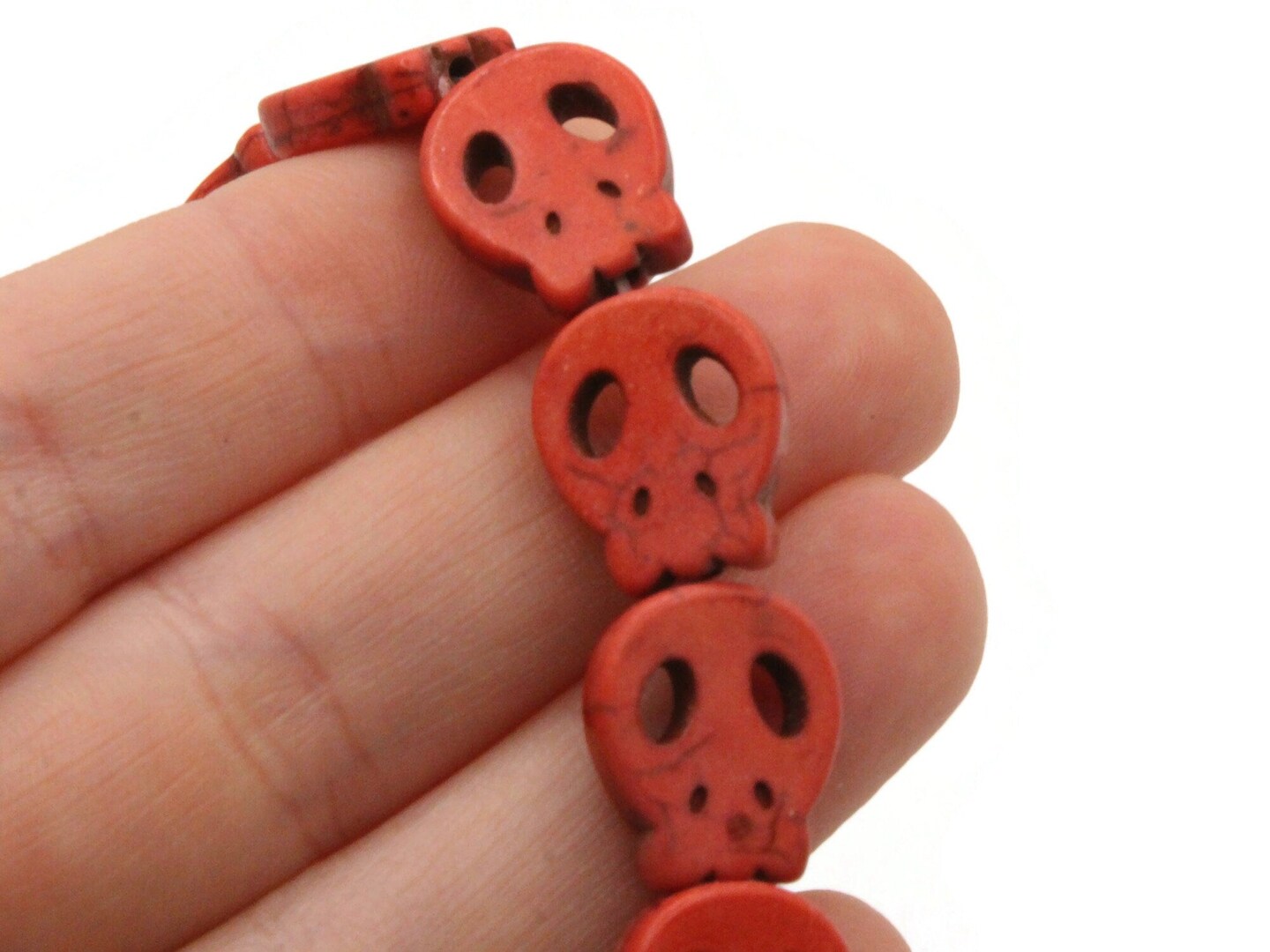 27 15mm Red Howlite Flat Skull Dyed Stone Beads | Michaels