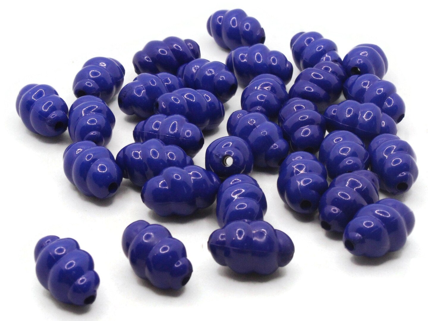 30 18mm Blue Plastic Twisted Oval Beads | Michaels