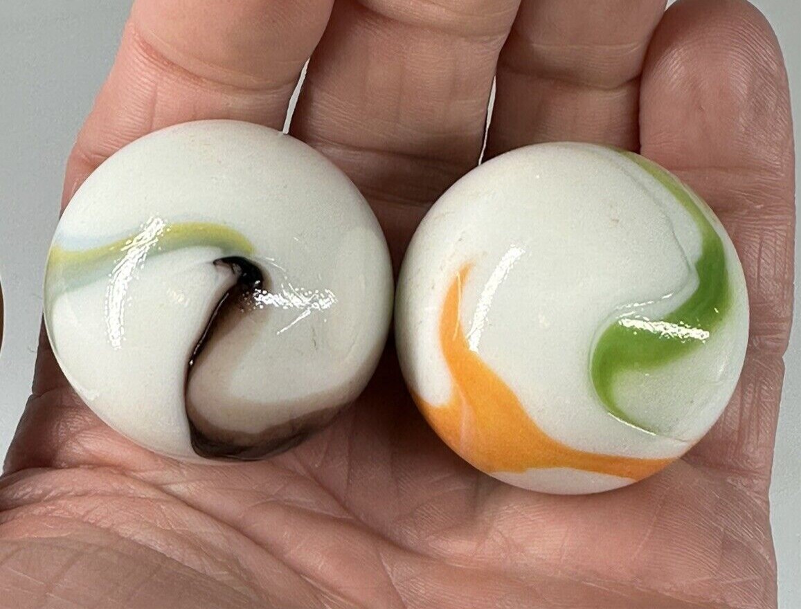 Lot includes 2 marbles, each is 1 3/8" (35mm) in size. (SWIRL COLORS ...