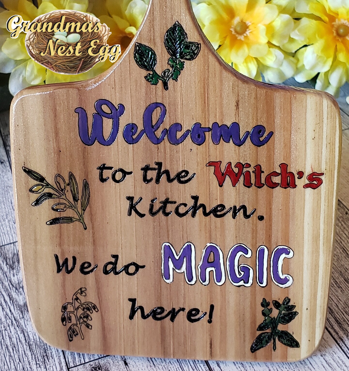 Funny "Witches Kitchen- we do Magic here" hanging wall sign. Looks like ...