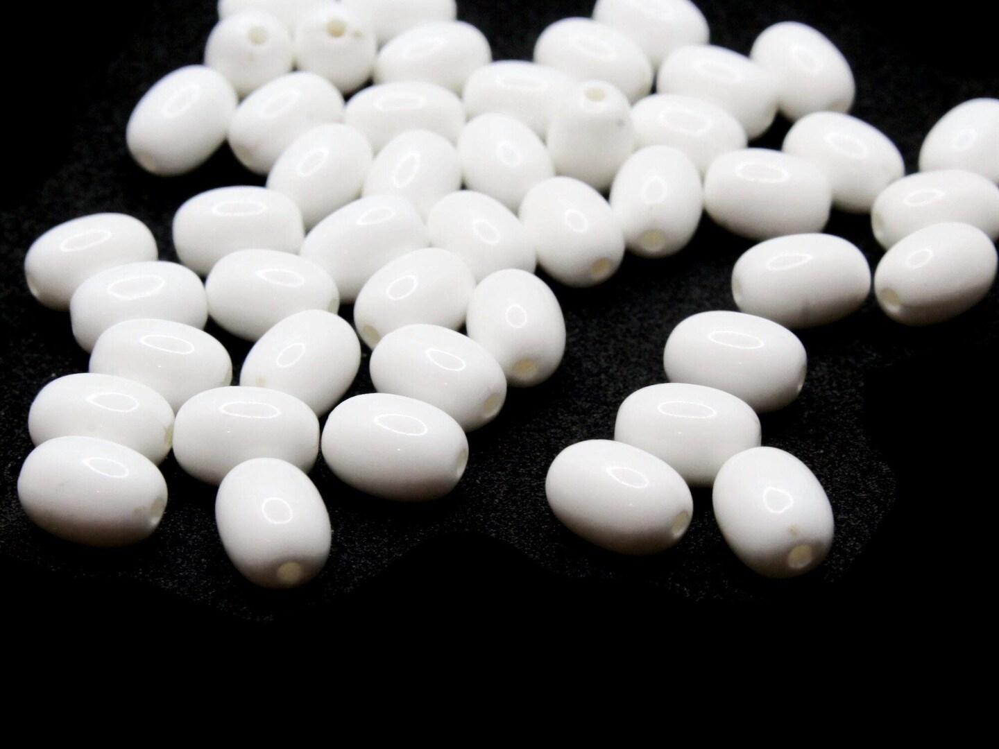 50 9mm Vintage White Smooth Oval Plastic Beads | Michaels