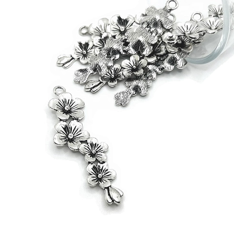 4, 20 or 50 Pieces: Silver Plumeria Plum Blossom Charms | Michaels