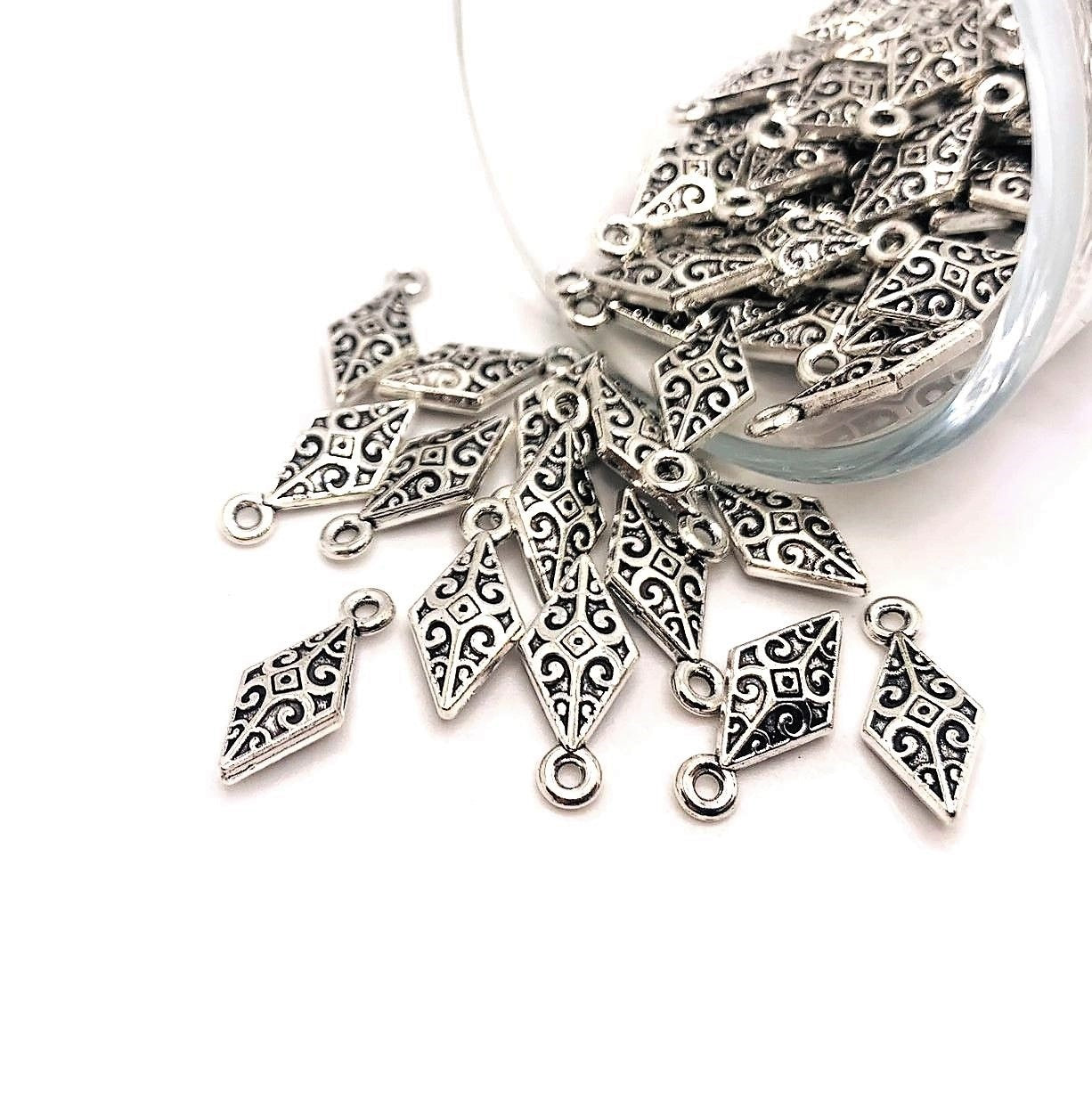 4, 20 or 50 Pieces: Silver Tribal Boho Ethnic Triangle Charms | Michaels