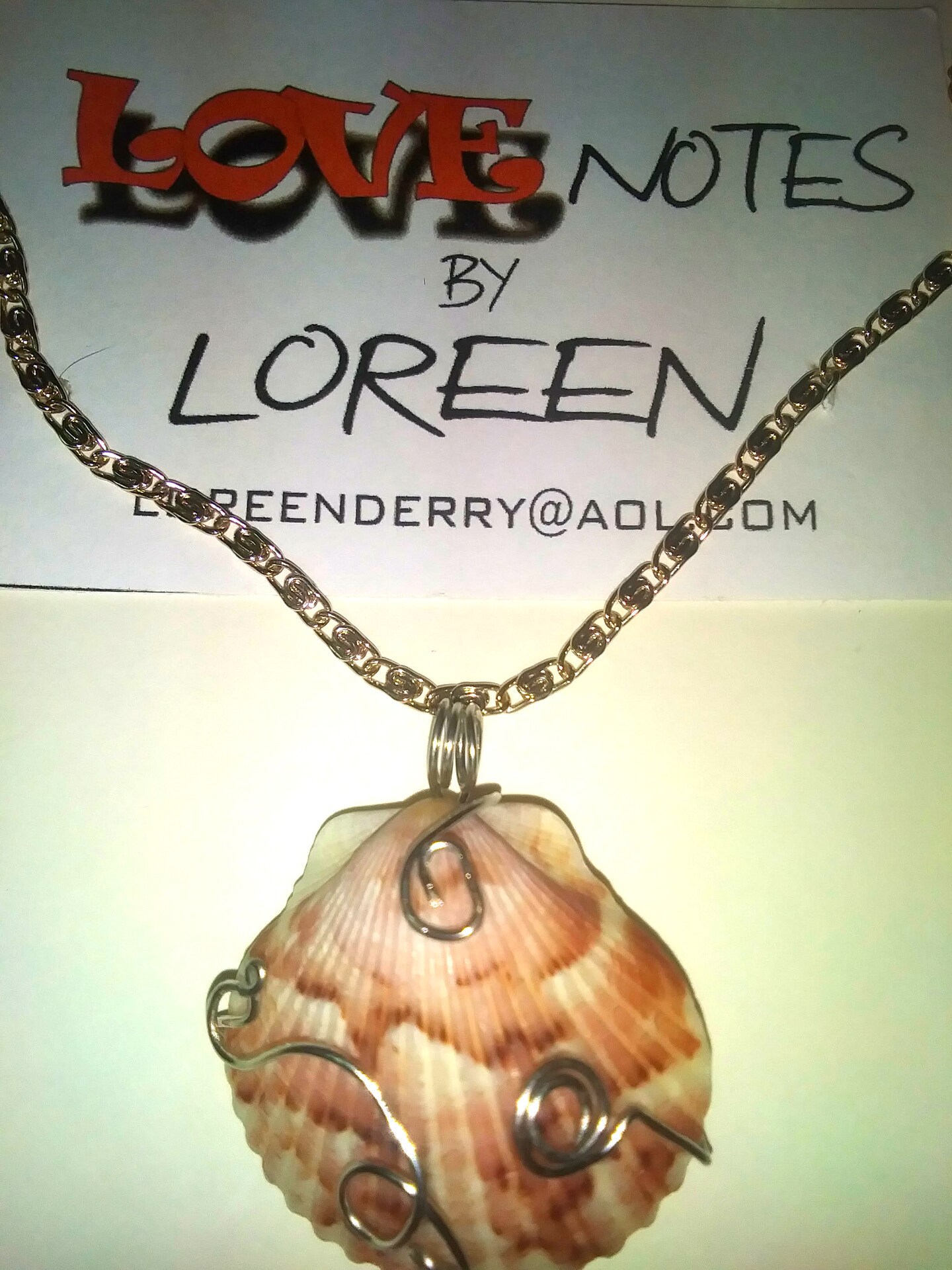 Florida seashell, cream with red swirls, wrapped with silver-plated ...