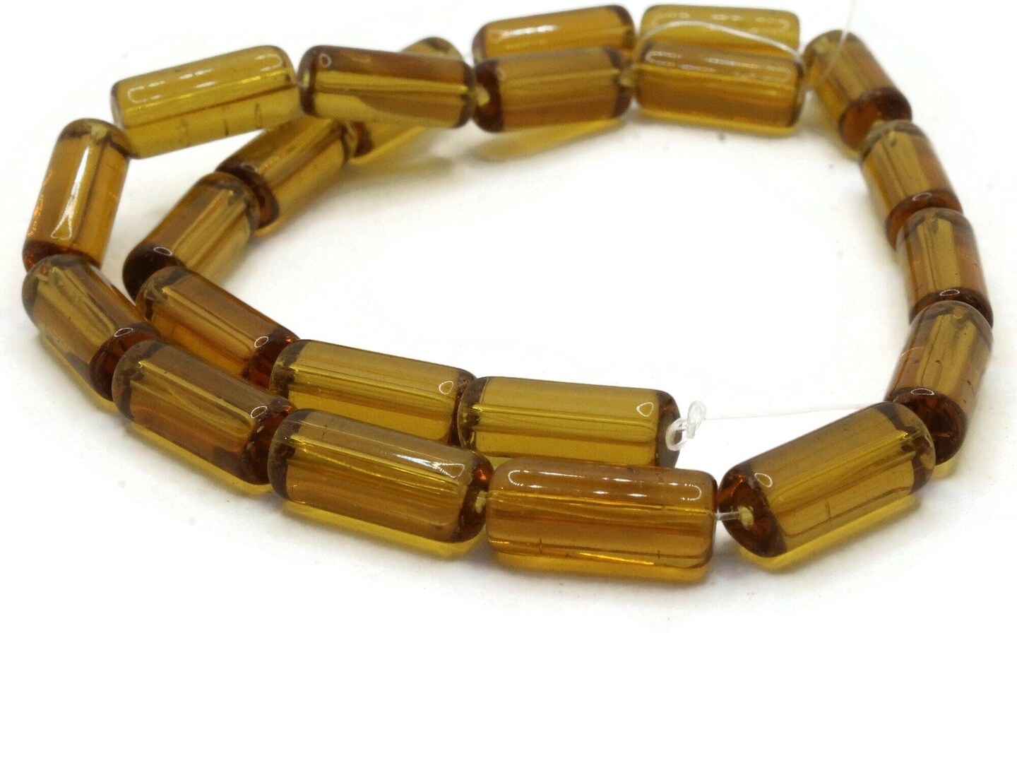22 15mm Clear Brown Glass Tube Beads | Michaels