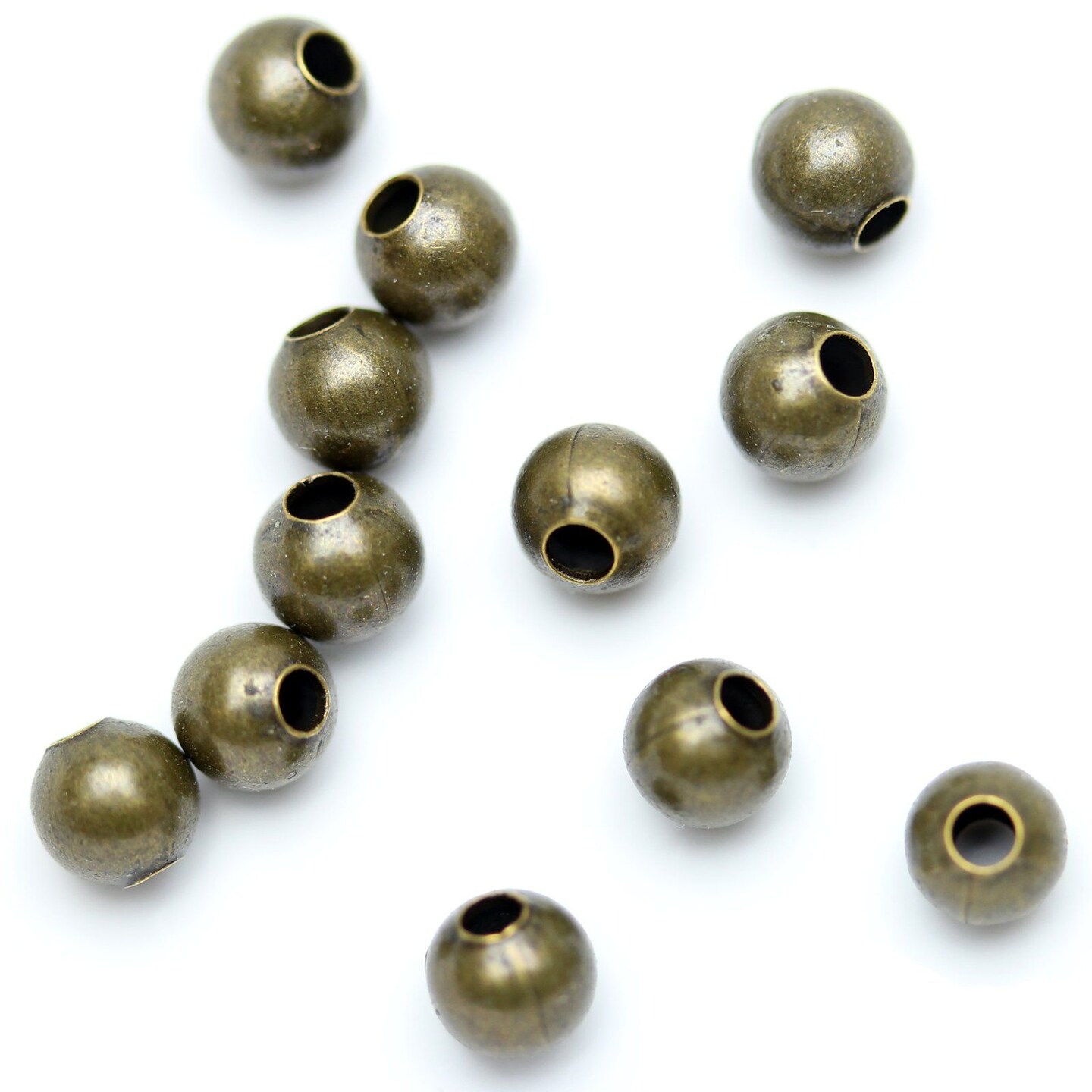 Antique Brass Plated Smooth Round Beads | Michaels