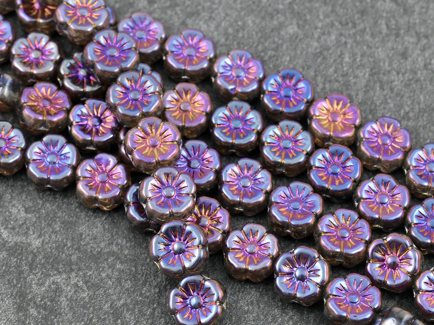 *12* 10mm Metallic Volcano Hawaiian Flower Beads | Michaels