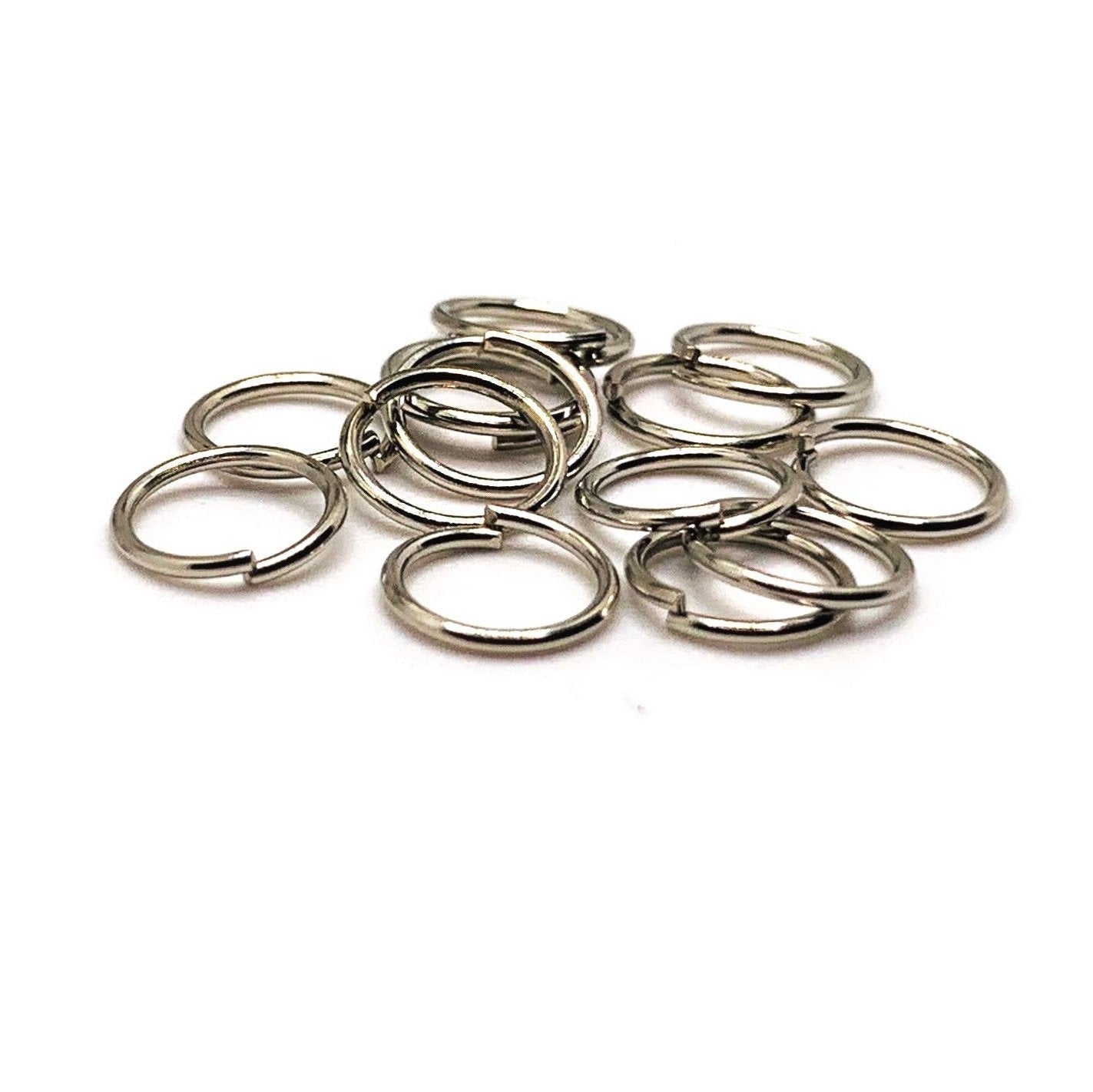 100, 500 or 1,000 Pieces: 7 mm Rhodium Silver Jump Rings, 21g | Michaels