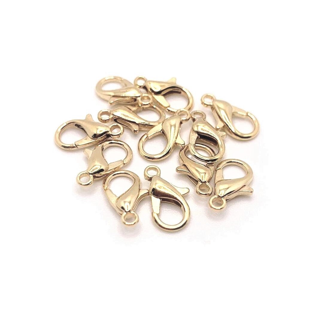 100 or 500 Pieces: 7 x 12 mm KC/Light Gold Lobster Claw Clasps | Michaels
