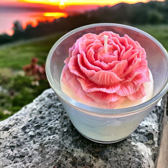 Large glass candle with floral candle accent | MakerPlace by Michaels