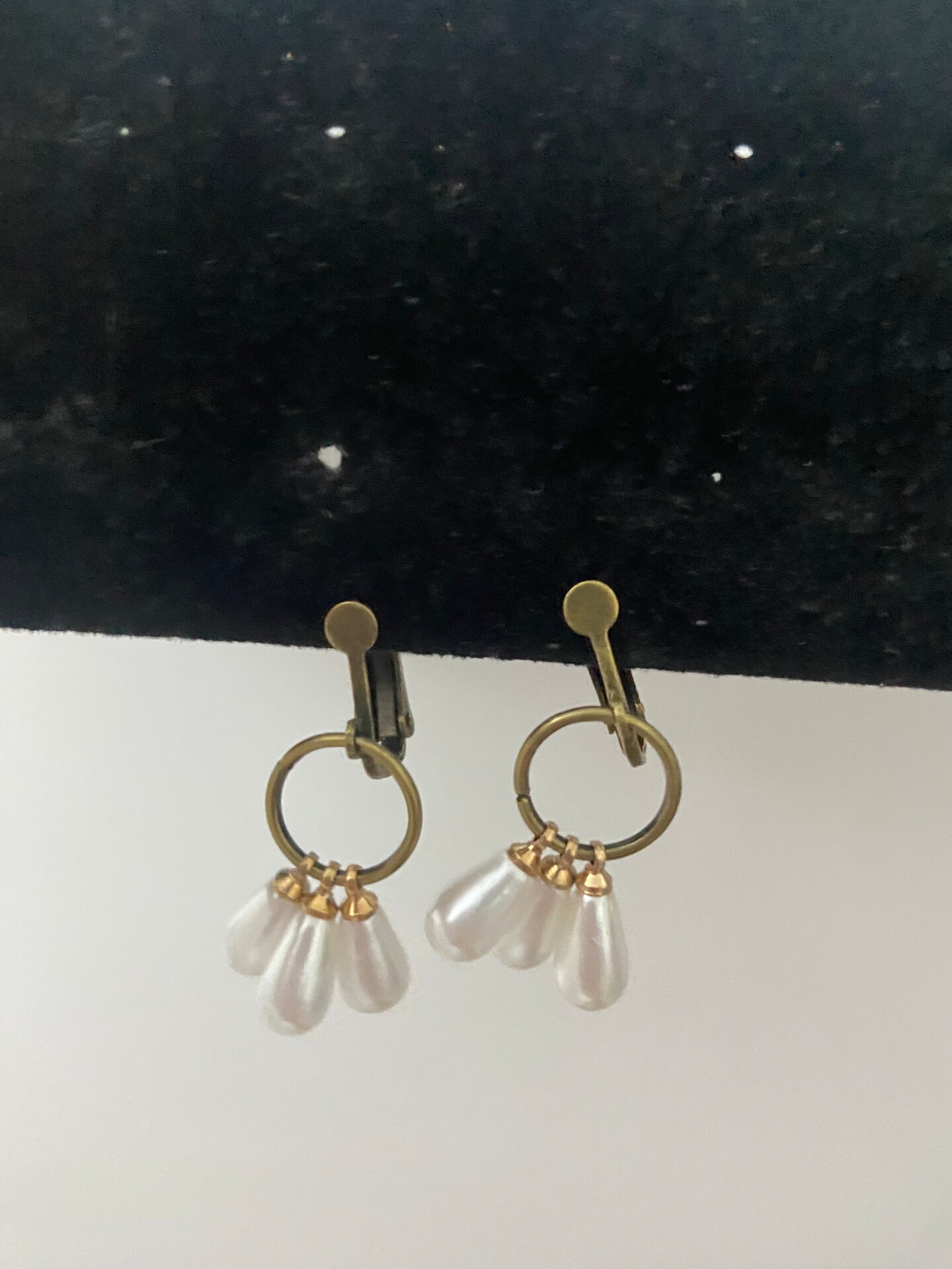 Faux pearl clip on earrings store
