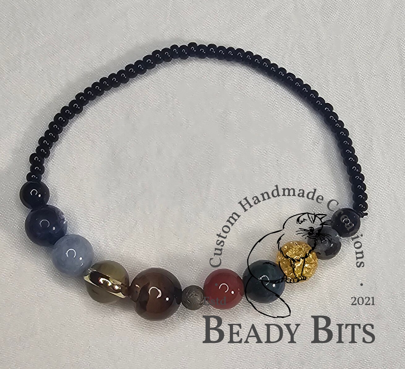 Galaxy of Gems Stretchy Solar System Bracelet | MakerPlace by Michaels