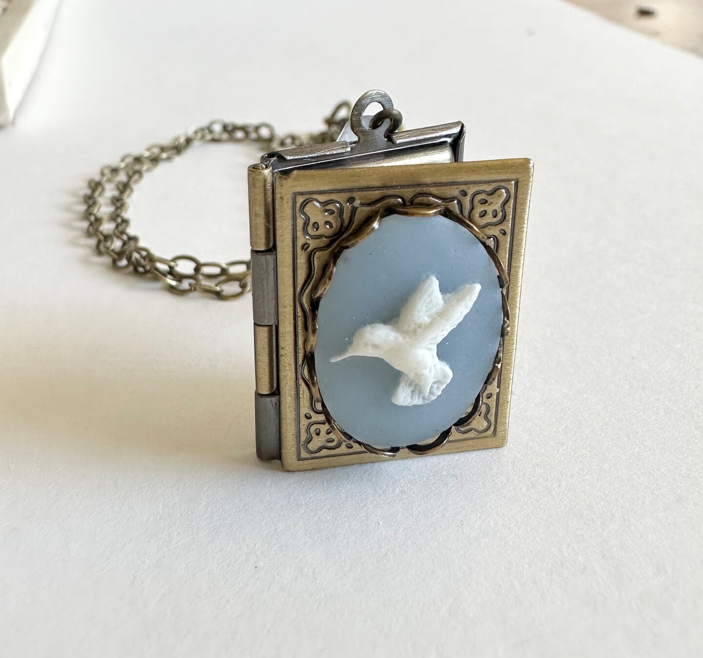 Hummingbird book locket necklace, blue cameo locket, soldered brass ...