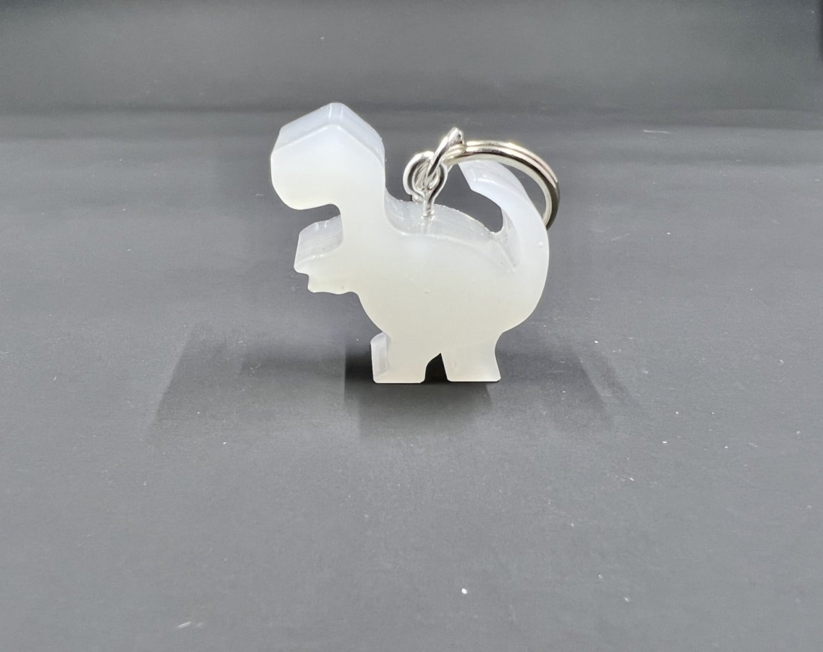 White Dinosaur Keychains | MakerPlace by Michaels