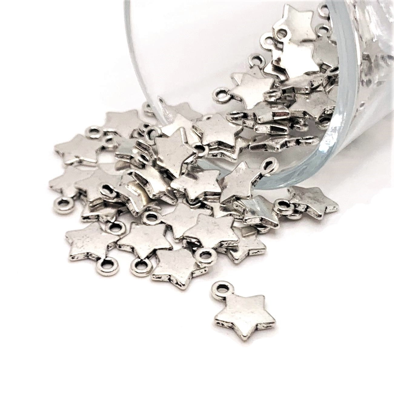 4, 20 or 50 Pieces: Small Silver Star Charms | Michaels
