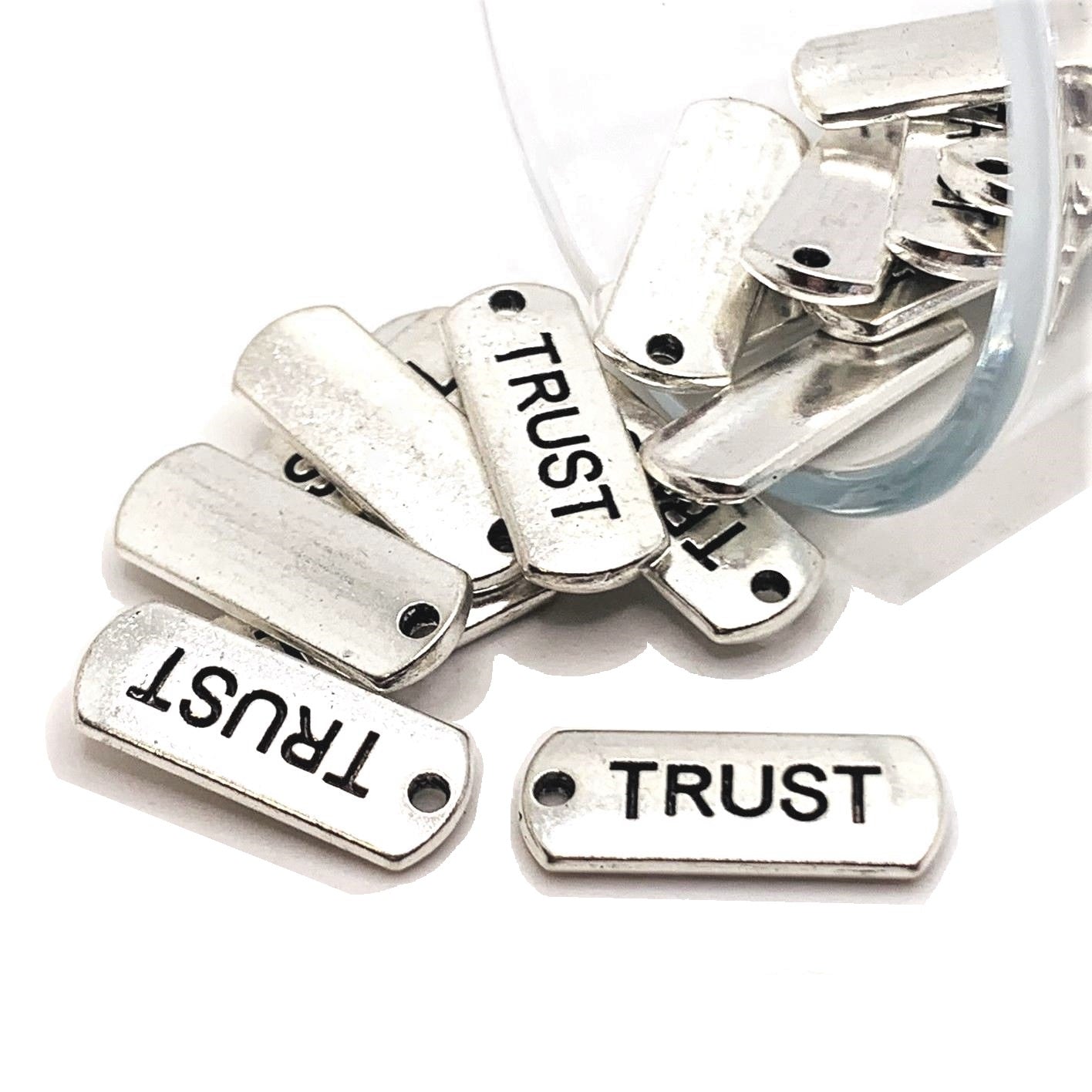 4, 20 or 50 Pieces: Silver Trust Word Bar Tag Charms | Michaels