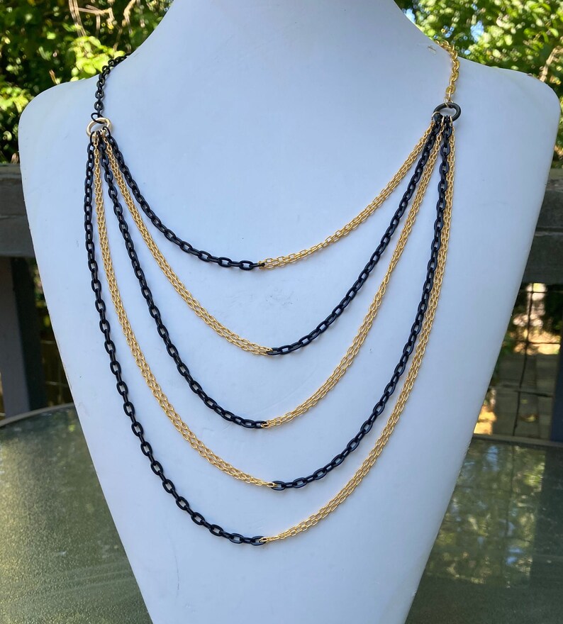 Black and Gold Switchback Chain Necklace | MakerPlace by Michaels