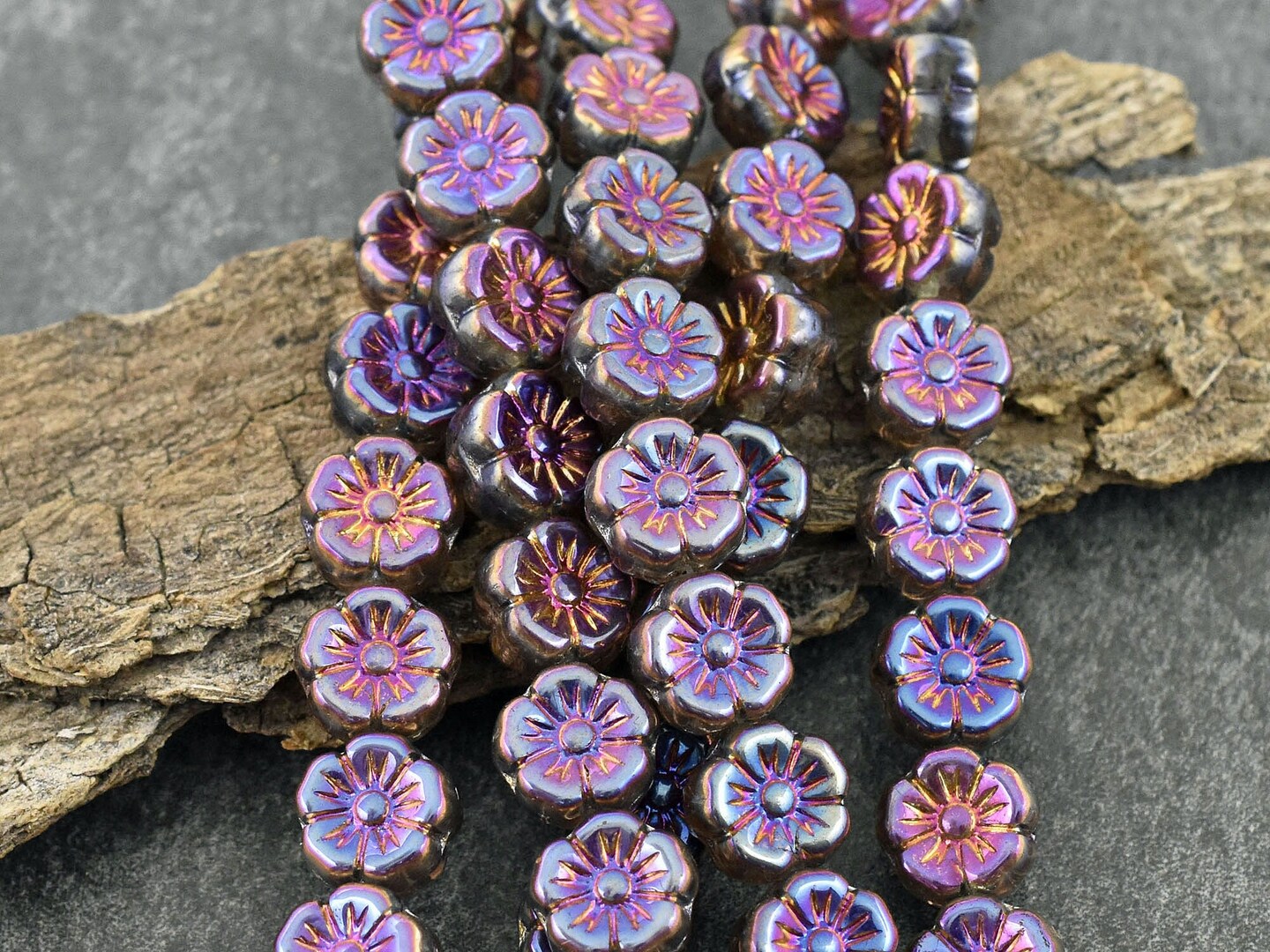 *12* 10mm Metallic Volcano Hawaiian Flower Beads | Michaels