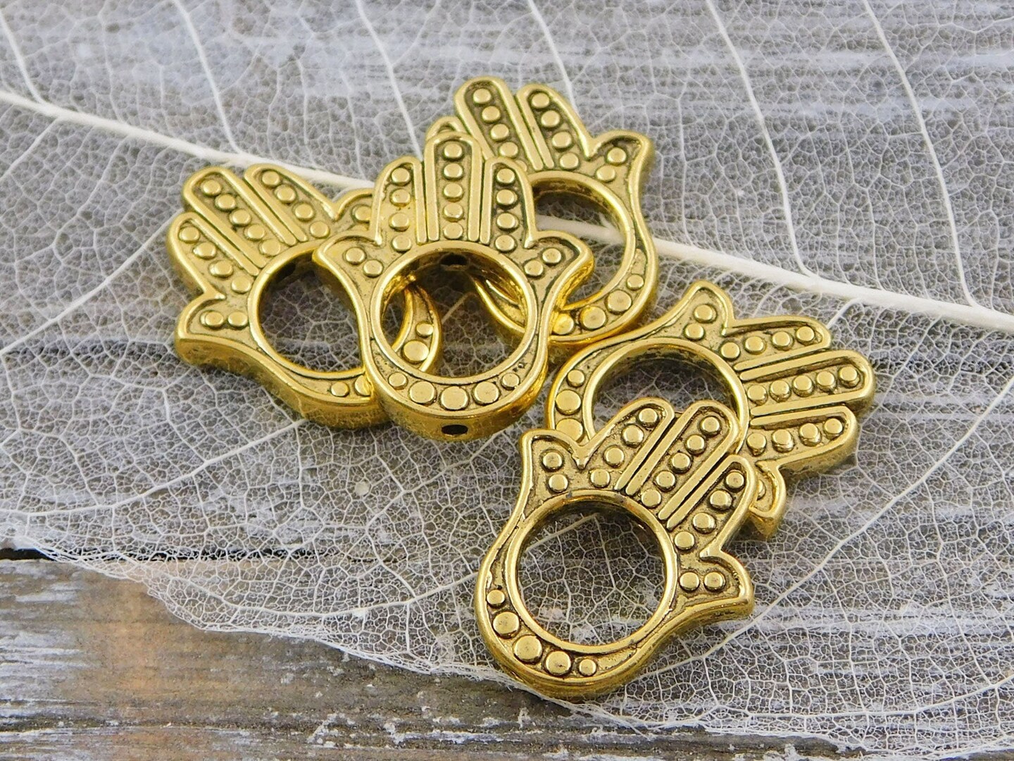 *10* 20x17mm Antique Gold Hamsa Hand Bead Frames | Michaels