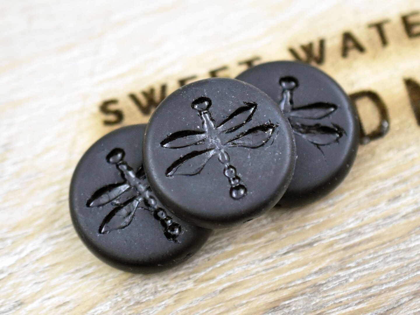 *2* 17mm Matte Black Dragonfly Coin Beads | Michaels