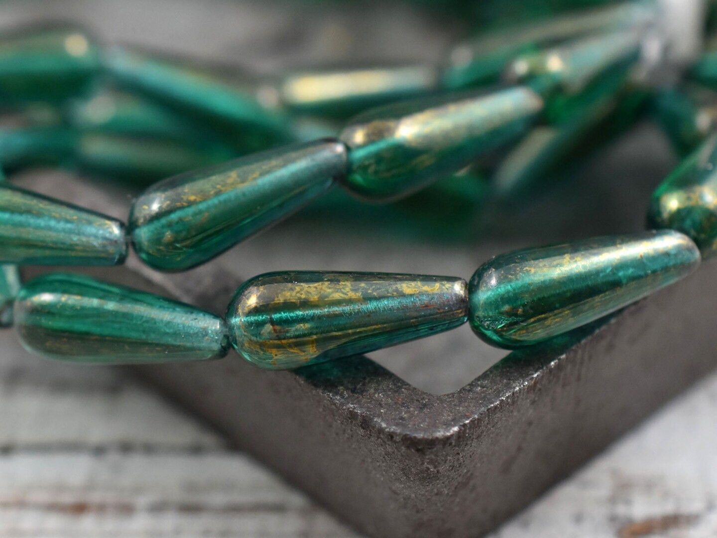 *10* 15x6mm Gold Washed Emerald Green Teardrop Beads | Michaels