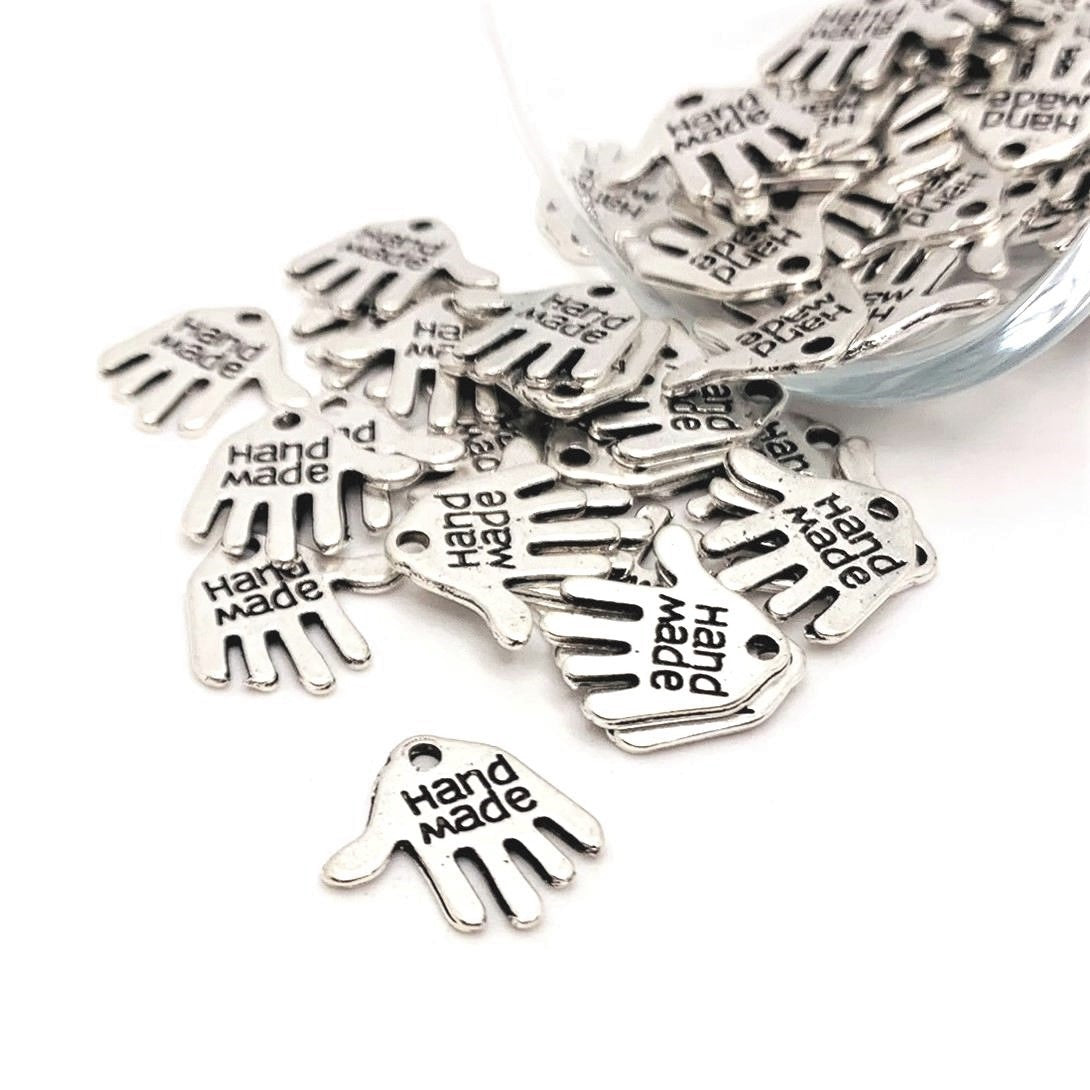4, 20 or 50 Pieces: Silver Hand Handmade Artisan Tag Charms | Michaels