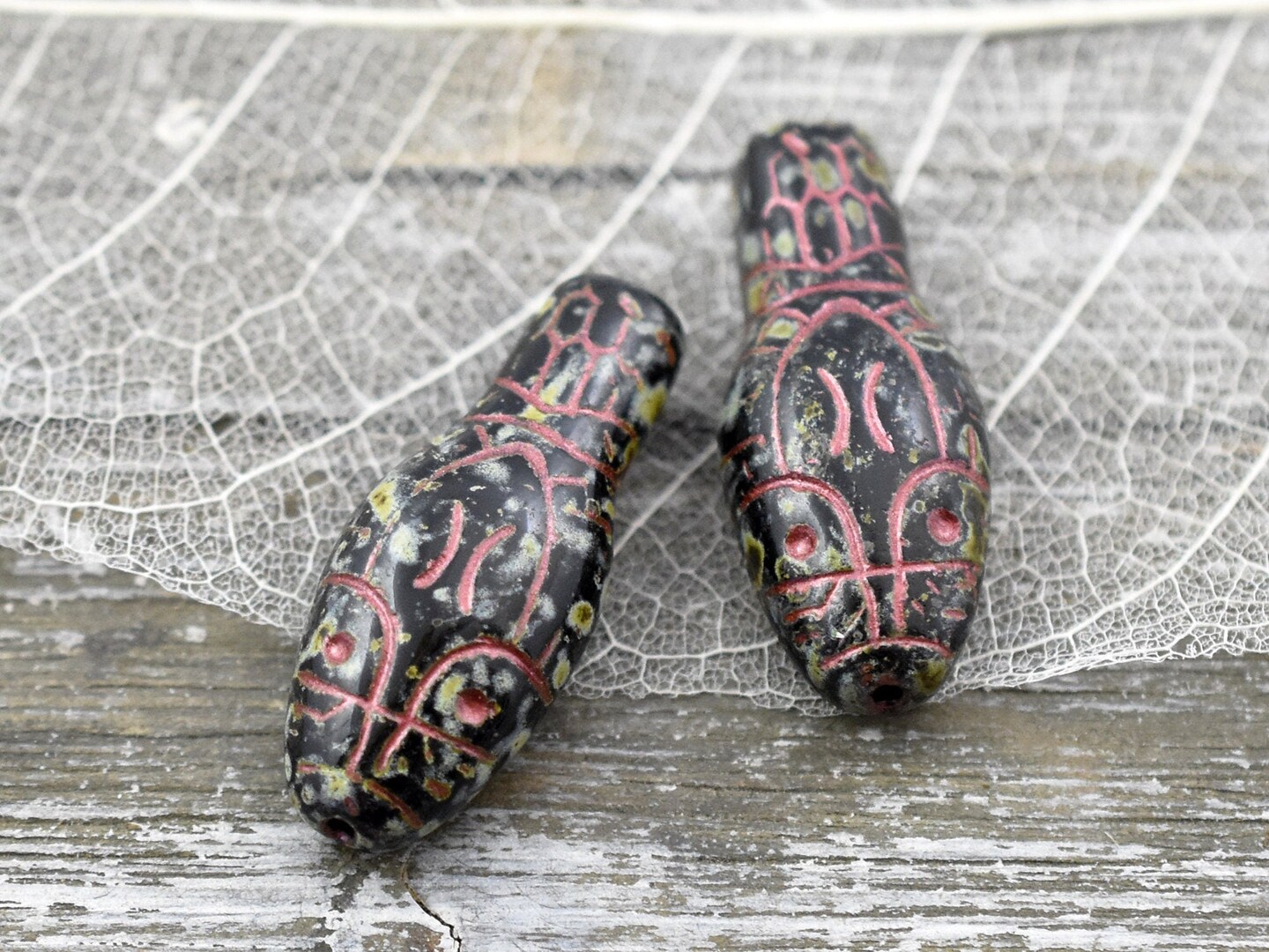 *4* 30x12mm Red Washed Jet Travertine Snake Head Beads | Michaels