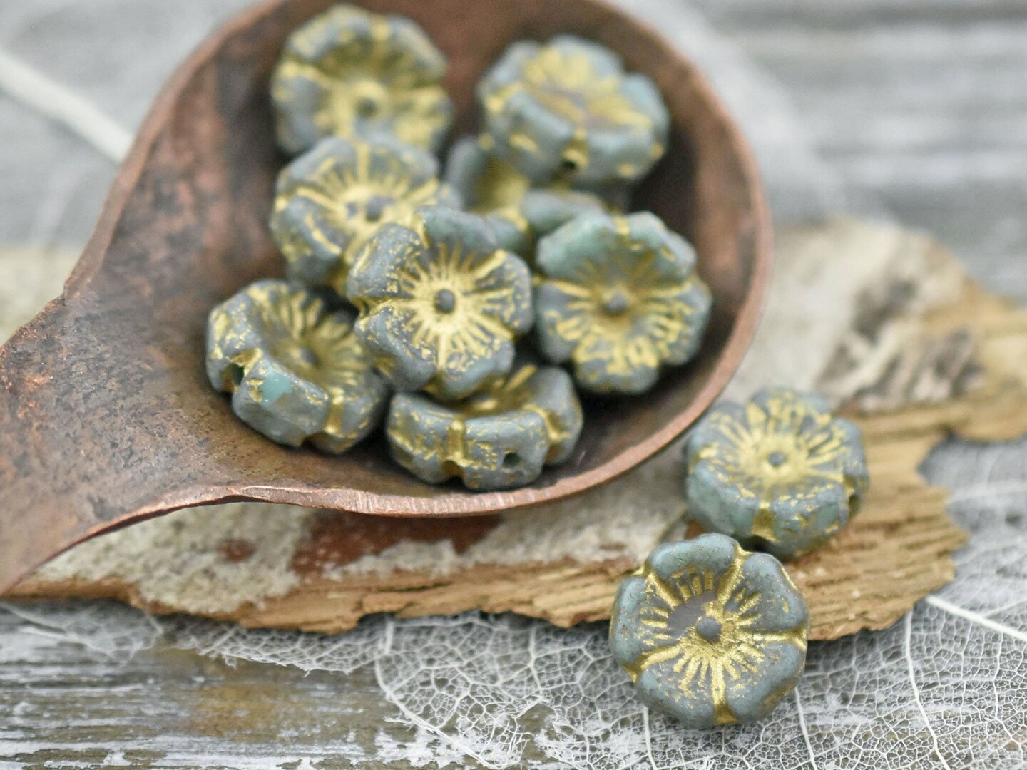 *6* 12mm Gold Washed Etched Sea Green Hawaiian Flower Beads | Michaels