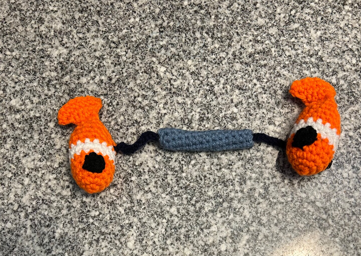 Fish fidget sold in a set of 3. They squish, stretching and, slide are ...