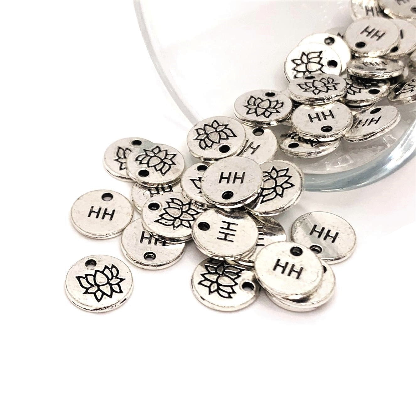 4, 20 or 50 Pieces: Tiny Silver Lotus Coin Charms | Michaels