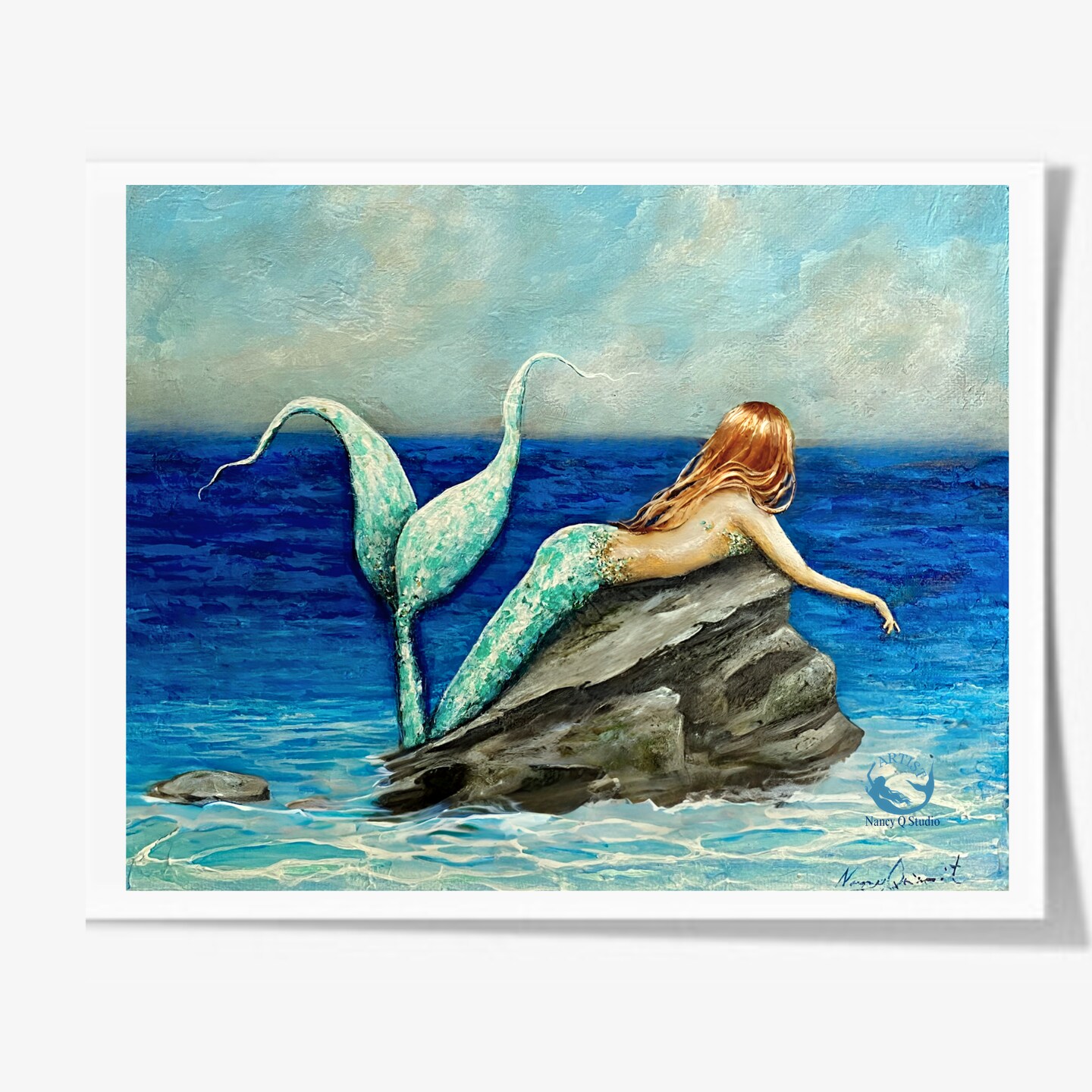 Mermaid laying on a beach rock art print | MakerPlace by Michaels