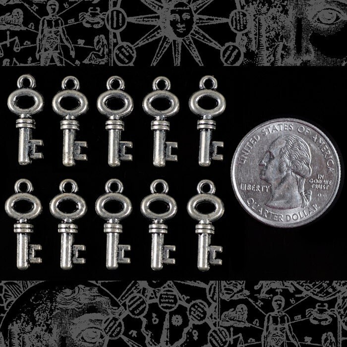 Antiqued Style Small Silver Key Charms -Set of Twelve - ZS-C13 | Michaels