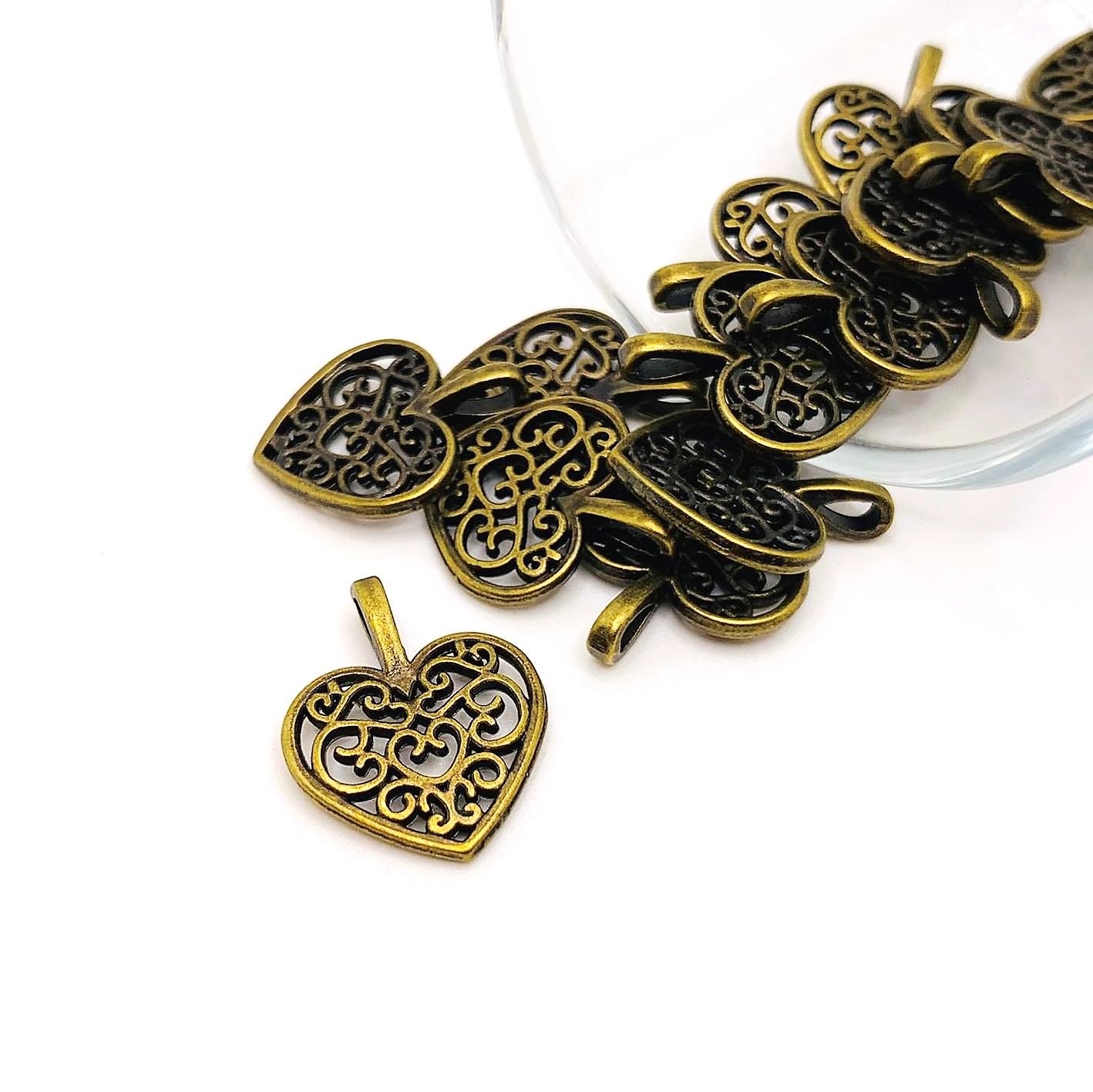 Bronze Filigree Scroll Heart Charms, 16x15mm | Michaels