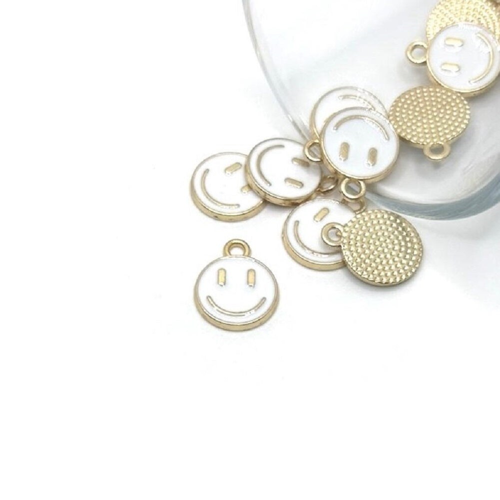 White Enamel Smiley Face Charms, 14x12mm | Michaels