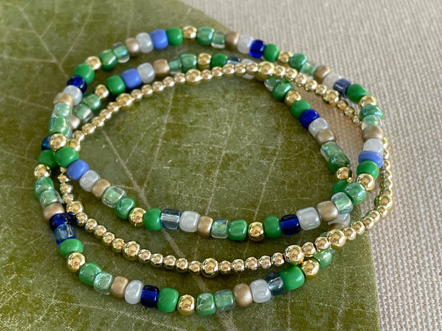 Timeless Blue and Green Glass and Gold Filled Beads Bracelet Stack | MakerPlace by Michaels
