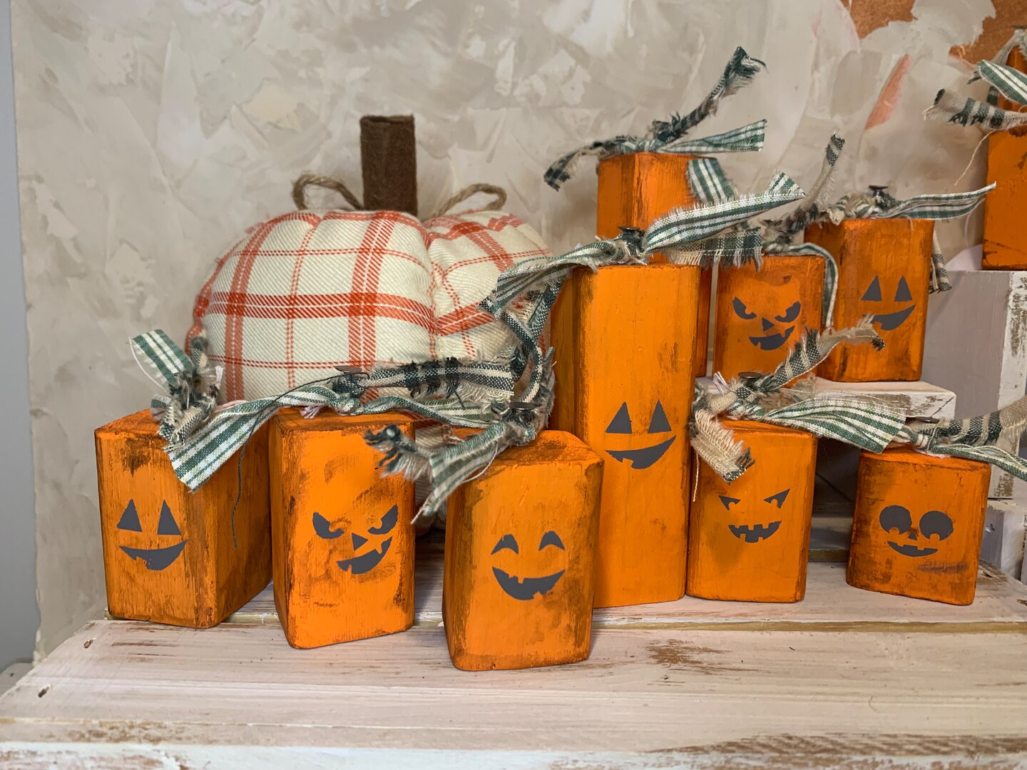 Rustic Wood Pumpkins with Jack-o-Lantern Faces | MakerPlace by Michaels