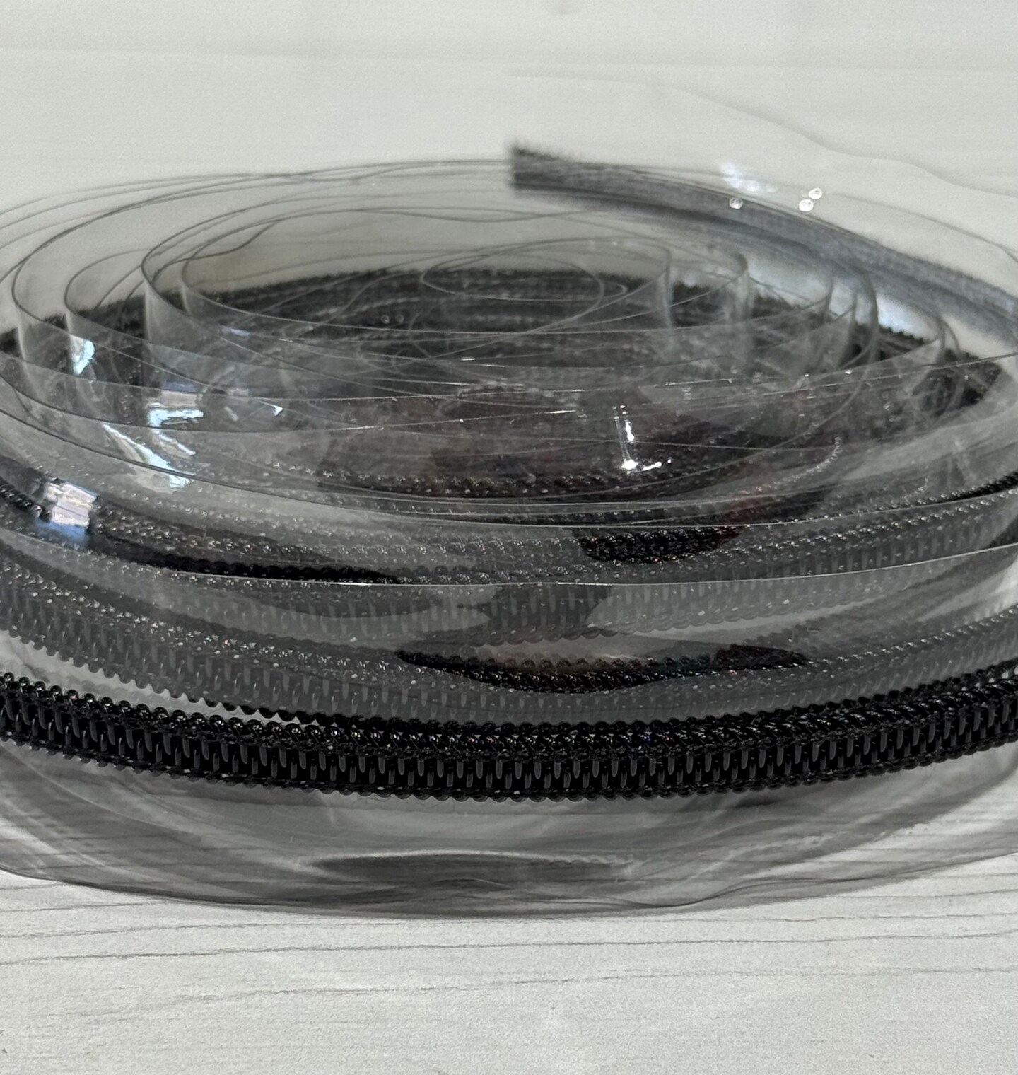 Clear zipper tape with Black teeth | Michaels