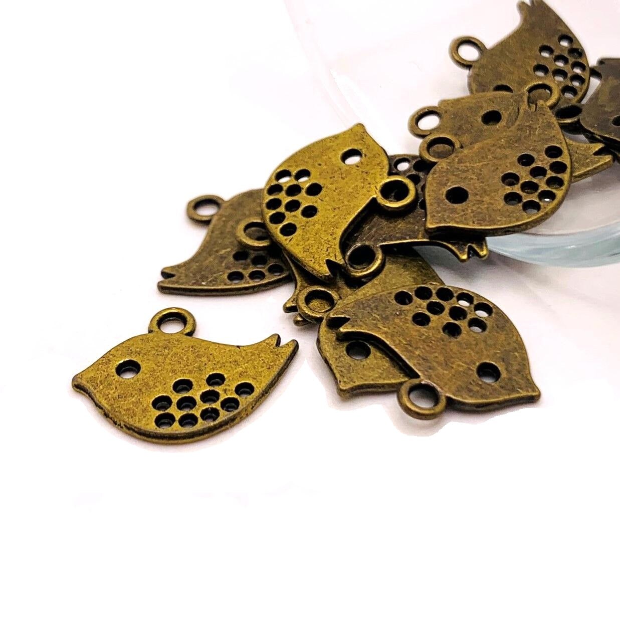 Small Bronze Bird Charms, 12x16mm | Michaels